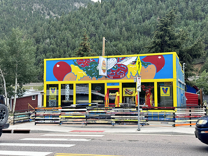 That rainbow fence made from old ski boards perfectly captures Idaho Springs' blend of mountain culture and creative food spirit.