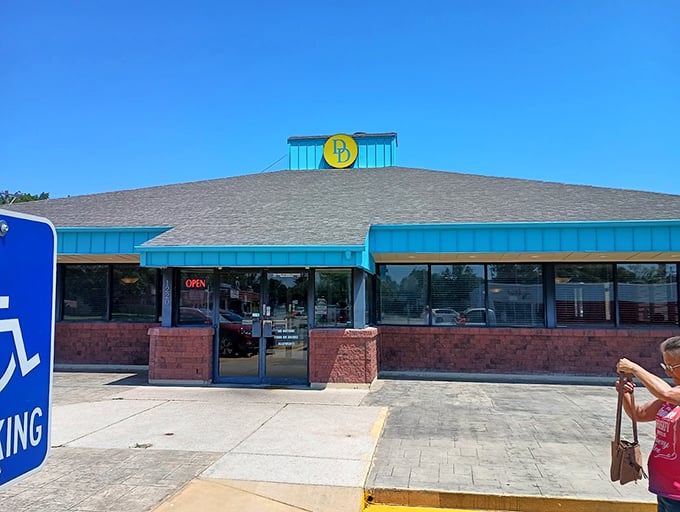 Bright blue accents make Delano's Diner pop against the Kansas sky. Inside, those famous cinnamon rolls are worth every minute of the wait.