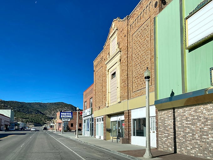 The historic buildings of Ely stand proudly against the clear blue Nevada sky, their brick facades telling stories of copper mining fortunes.