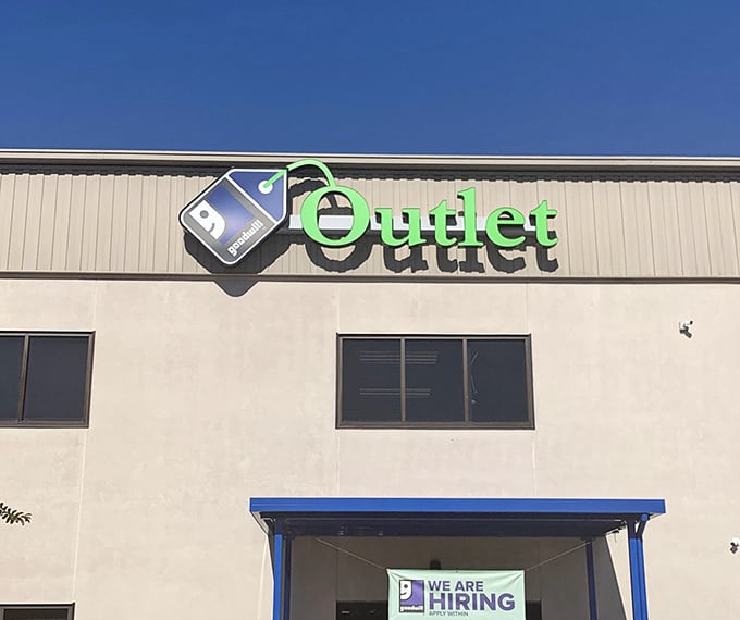 The simple green signage belies the complex treasure hunting system that awaits outlet shopping veterans.