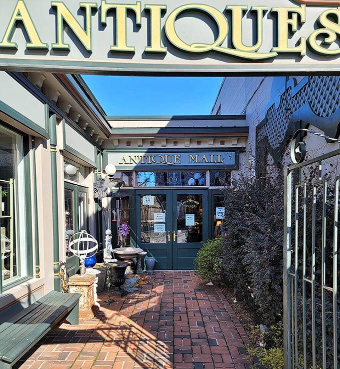 Behind this charming courtyard entrance lies the kind of antique shopping experience that makes every discovery feel magical.