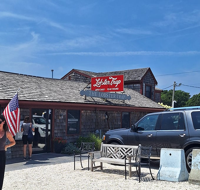 The weathered exterior tells stories of countless storms, while inside, fresh seafood creates new happy memories daily.