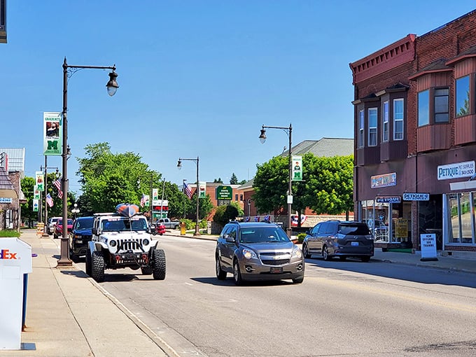 Manistique's downtown offers that perfect small-town movie backdrop—the kind where the protagonist discovers both affordable housing and themselves.