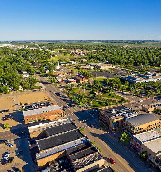 Tree-canopied streets where your retirement budget gets the royal treatment it deserves in southwestern Minnesota.