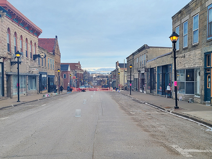 Descending into Mineral Point feels like time travel with parking—those glowing street lamps illuminate Wisconsin's Cornish connection better than any history documentary ever could.