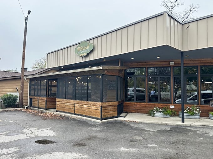 The screened patio at Mitchell's is the perfect spot to savor your sandwich while people-watching on a sunny day.