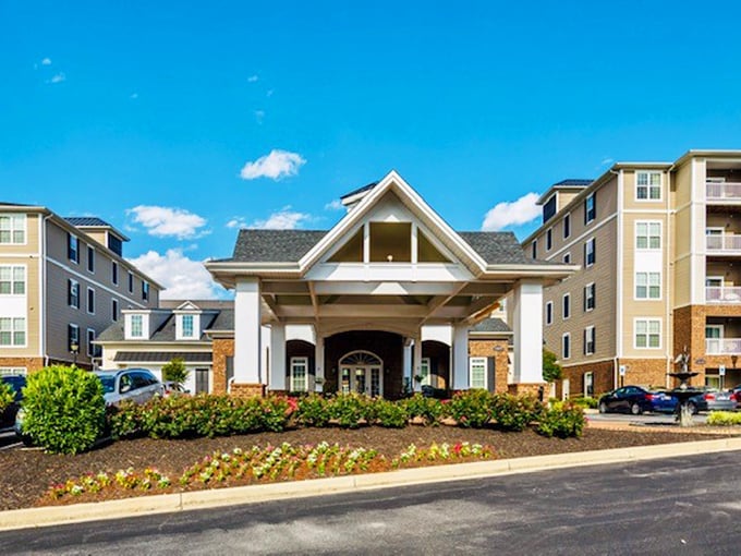 Grand entrance or vacation resort? Regency Crest's welcoming facade sets the tone for upscale living without the upscale price.