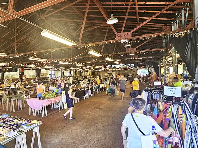 Indoor market perfection where high ceilings create cathedral-like spaces for worshipping great deals and hidden gems.
