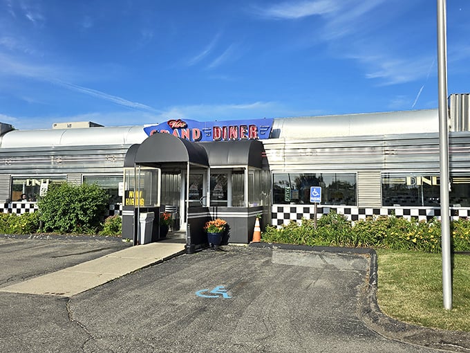 Classic stainless steel curves and checkered trim—this isn't just a diner, it's a slice of Americana served with coffee.
