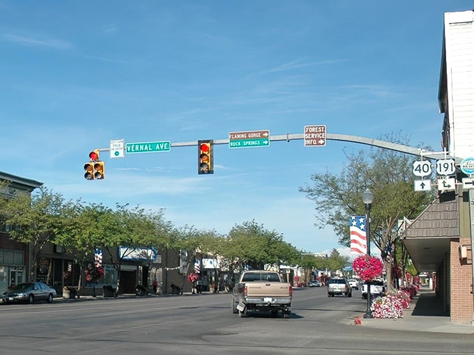 Vernal Avenue welcomes visitors with hanging flower baskets and prices that won't make your credit card wilt.