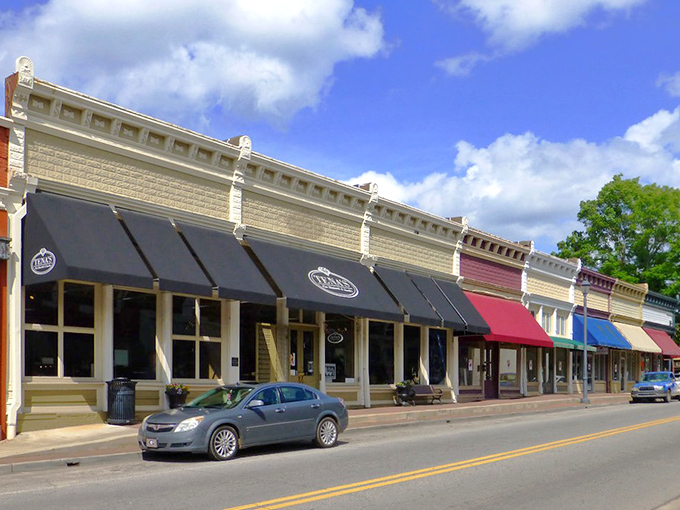 Classic storefronts line up like old friends, each one ready to welcome you home.