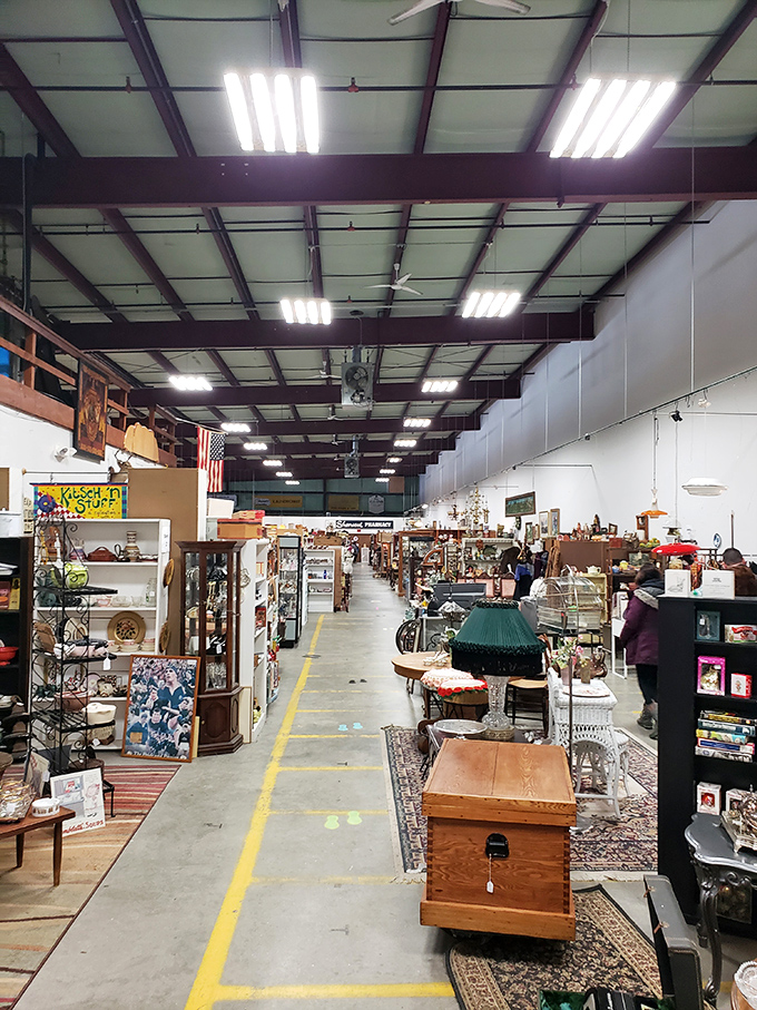 The treasure hunt begins! Wide aisles filled with vendor booths create a labyrinth of nostalgia where time stands still and wallets open.