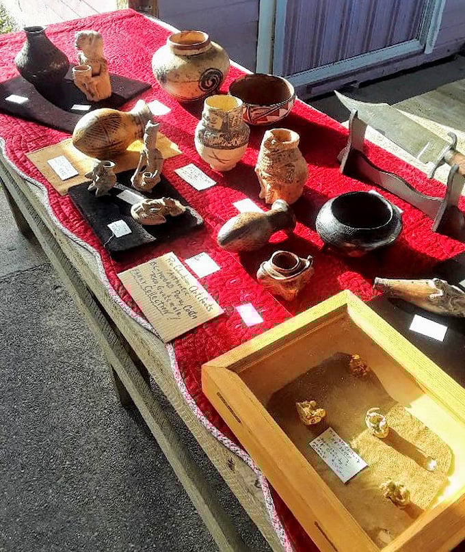 Ancient pottery displayed on vibrant red cloth—like archaeological treasures that somehow ended up in Florida instead of a museum.
