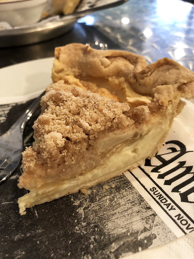 That crumb topping on apple pie isn't just decoration; it's the crunchy sweet finale every slice deserves.