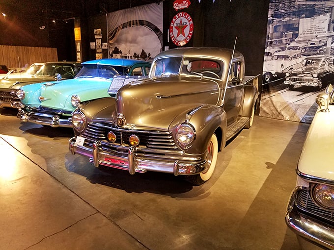 Classic cars gleam under museum lights, reminding us of an era when automobiles weren't just transportation but rolling sculptures of American optimism.