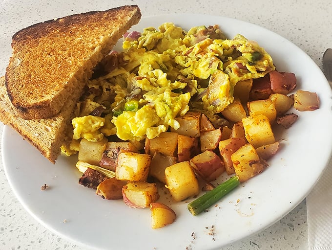 Some relationships are meant to be—like eggs, spinach and cheese in this sandwich that proves breakfast between bread is never a bad idea.