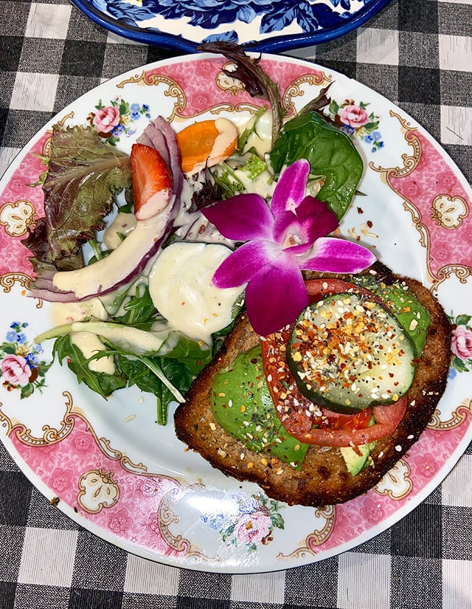 Avocado toast that Instagram influencers would cross state lines for. That edible flower isn't compensating for anything—the flavor stands tall on its own.