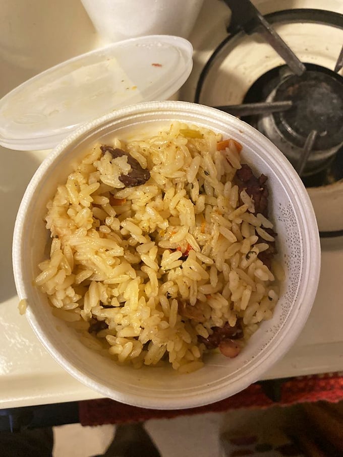 Spanish rice with smoky bits of barbecue mixed in—proof that cultural fusion isn't just for fancy restaurants. This is comfort in a cup.