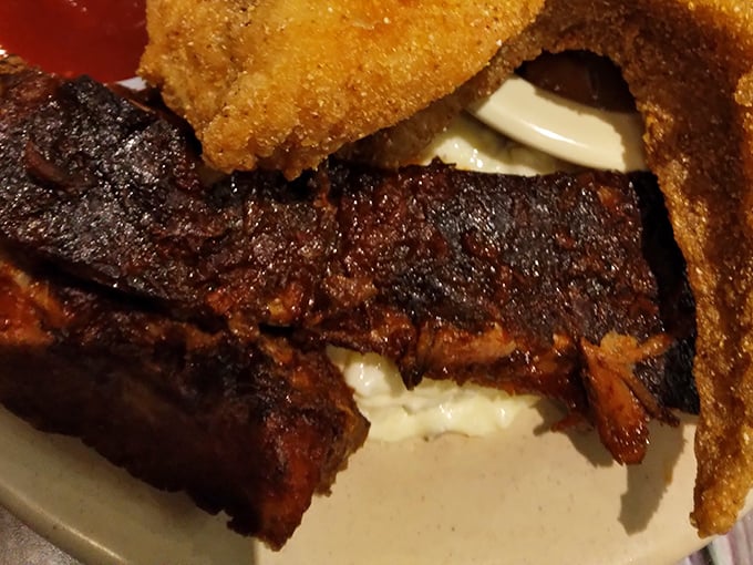 Fall-off-the-bone ribs with a bark so perfect, BBQ enthusiasts might shed a tear of respect before diving in face-first.