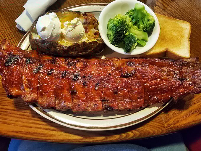 These ribs don't just fall off the bone – they release with perfect tension, their lacquered exterior giving way to juicy meat that's worth the sticky fingers.