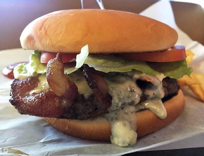 When bacon meets burger, magic happens. This beauty's special sauce is practically begging to run down your arm.