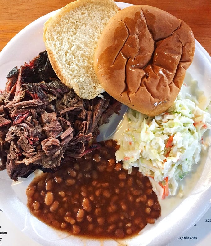 The perfect barbecue plate doesn't exi— Oh wait, here it is: chopped beef, coleslaw, and baked beans forming the Bermuda Triangle of deliciousness.