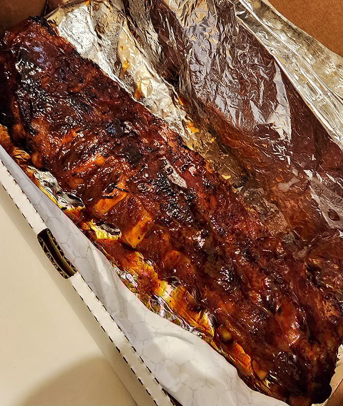 BBQ ribs glistening with sauce that would make your dry-cleaning bill worth every penny—this is why napkins were invented.