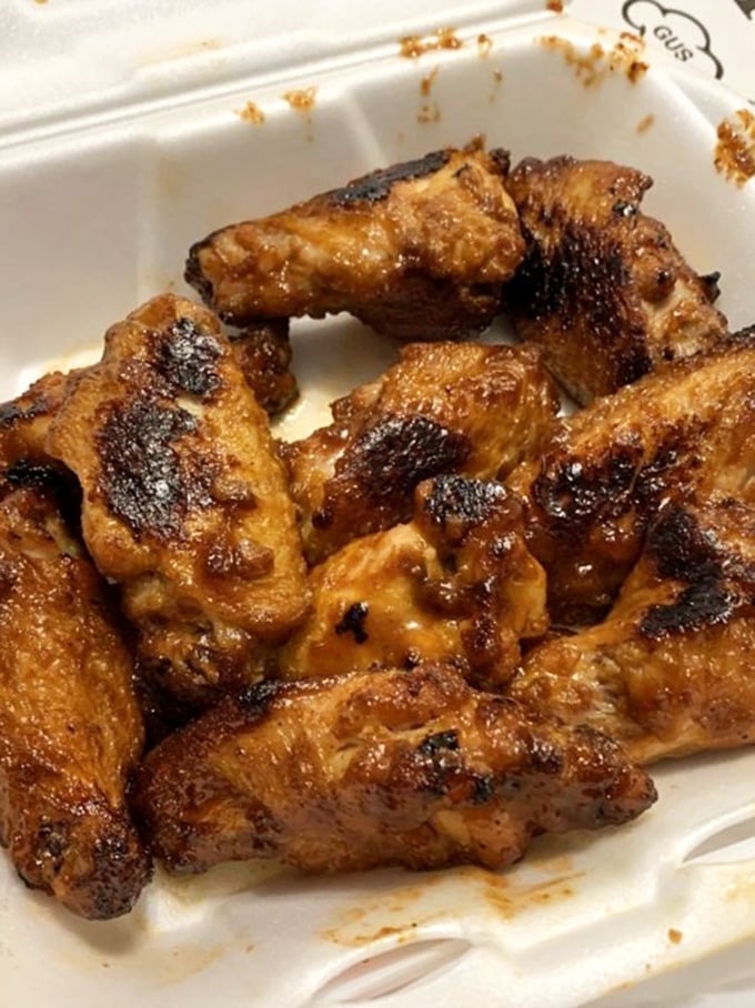 These wings aren't just an afterthought—they're oven-roasted to caramelized perfection with charred edges that would make a pitmaster proud.