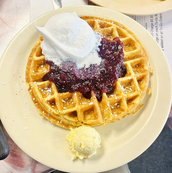 Belgian waffles crowned with berries – proof that sometimes more really is more.