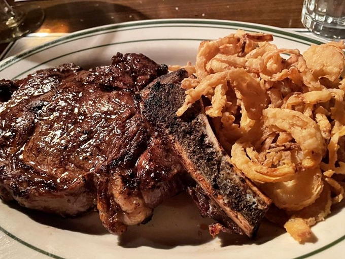 The bone-in ribeye with those golden onion rings – a combination so perfect it should have its own national holiday.