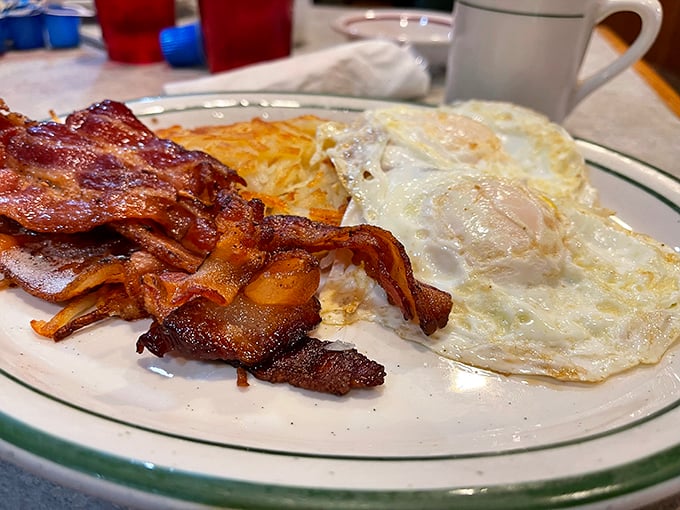 Bacon crisped to perfection, eggs with edges just slightly caramelized—this is the breakfast equivalent of hitting all green lights on your morning commute.