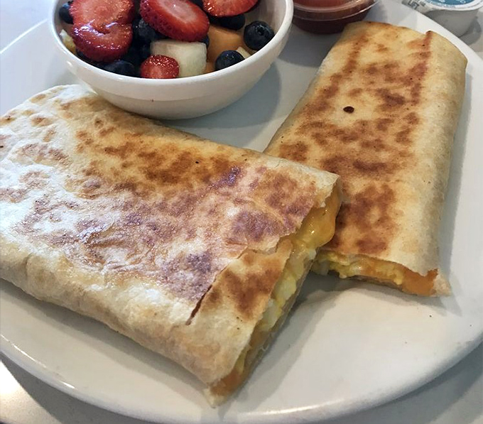 Breakfast that doesn't know it's not in Mexico. Grilled to perfection, these breakfast burritos offer a morning fiesta alongside fresh fruit that actually looks fresh.