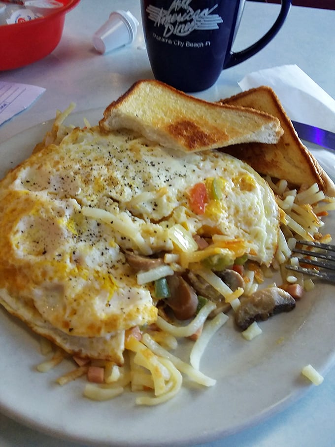 Eggs, hash browns, and toast—the holy trinity of breakfast executed with diner precision and zero pretension.