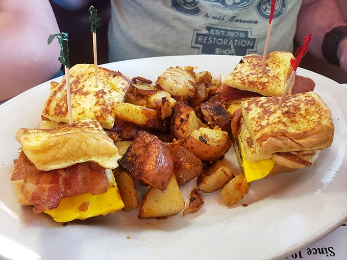The breakfast sandwich – architecture you can eat! Toasted bread, melty cheese, and those home fries that could make a potato farmer weep with pride.