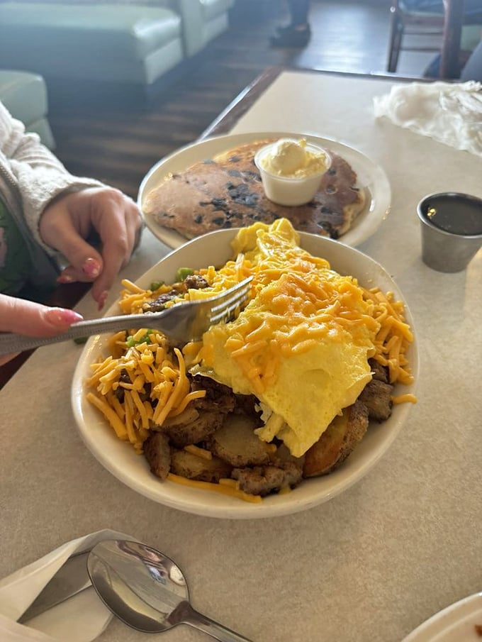 A breakfast skillet that answers the eternal question: "What if everything delicious decided to hang out on the same plate?"