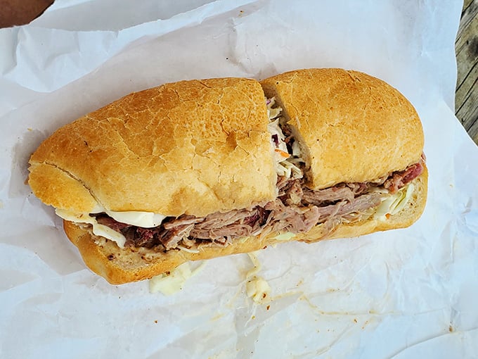 The cochon de lait po' boy: where New Orleans tradition meets smoke mastery. French bread has never been happier about its life choices.