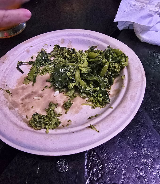 Broccoli rabe, sautéed to Italian perfection, offers a bitter counterpoint to the rich beef—like the perfect supporting actor who steals the scene.