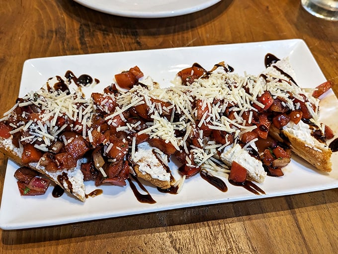 Bruschetta that makes you wonder why you ever settled for lesser versions – like discovering your favorite song was a cover all along.