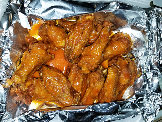 Wings that don't need a sports bar to shine. These golden-fried beauties are ready for their close-up—and your appetite.