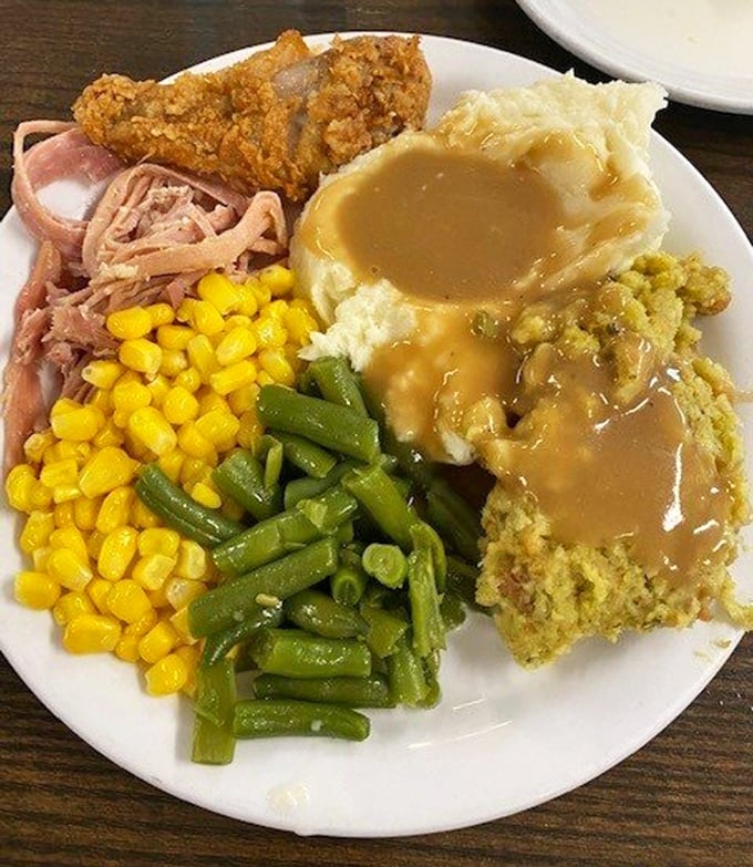 The perfect buffet plate doesn't exi— Oh wait, here it is! A masterclass in strategic food arrangement that would make Tetris champions proud.