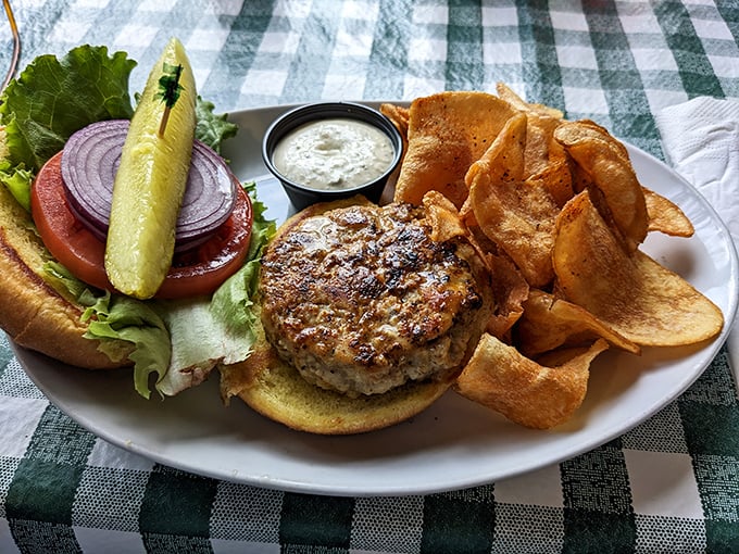 This isn't just a burger—it's a masterclass in simplicity done right. The house-made chips are the supporting actors who steal the show.