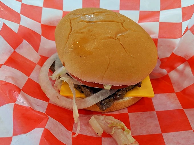 A cheeseburger that doesn't need Instagram filters – just your undivided attention and an empty stomach. American poetry on a bun.