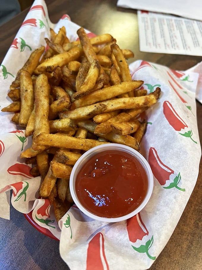 These aren't just fries – they're golden vehicles for ketchup delivery, seasoned with what can only be described as Southern magic dust.