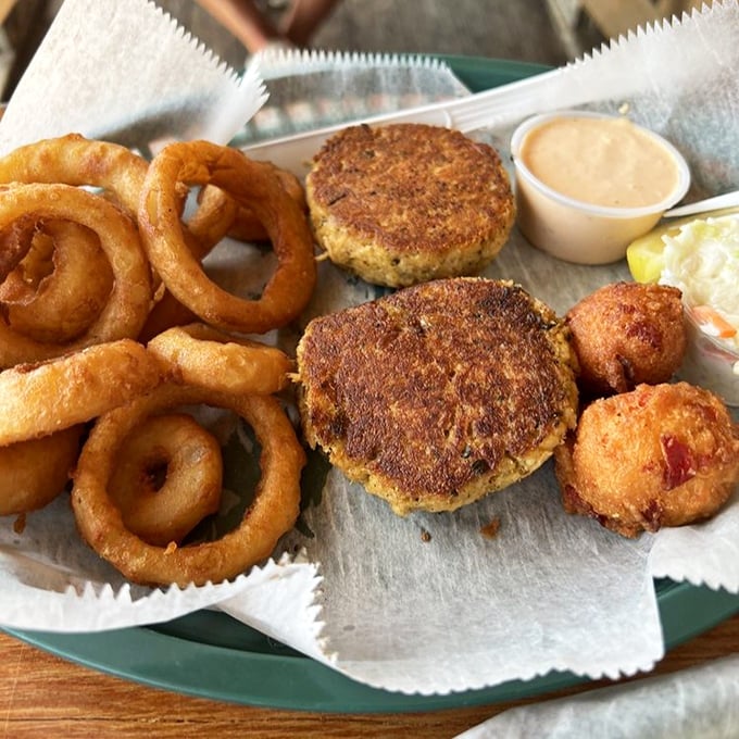 Crab cakes and onion rings: the beach vacation power couple. Crispy, golden comfort that pairs perfectly with the sound of crashing waves.