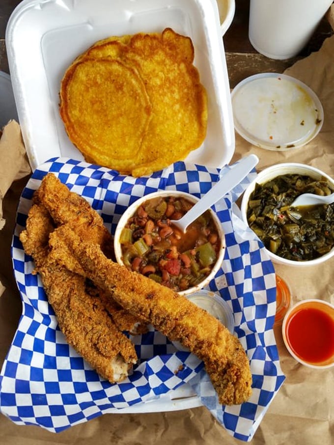 Fried chicken that achieves that mythical balance—shatteringly crisp exterior giving way to juicy meat within. The gravy cup is not optional.
