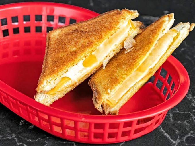 The humble grilled cheese—elevated to art form. When cheese pulls like this, it's not just lunch; it's performance art on a plate.