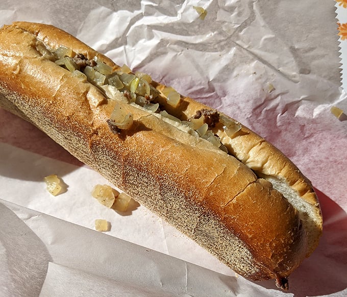 A proper cheesesteak should be simple yet sublime – tender meat, melty cheese, and a roll that's both sturdy and yielding, just like this beauty.