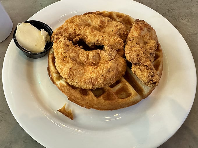 Chicken and waffles—the breakfast-dinner hybrid that proves some of the best relationships are unexpected. That golden-fried chicken perched atop a waffle is pure romance.