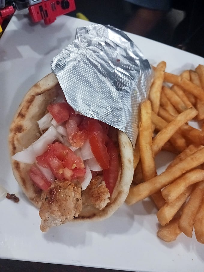 This chicken gyro wraps seasoned meat, fresh vegetables, and tangy sauce in warm pita—proof that diners do global cuisine with surprising authenticity.
