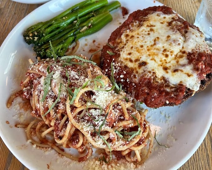 Pasta, chicken, and melted cheese—the holy trinity of comfort food gets the Basque treatment with bright tomato sauce and perfectly charred asparagus.